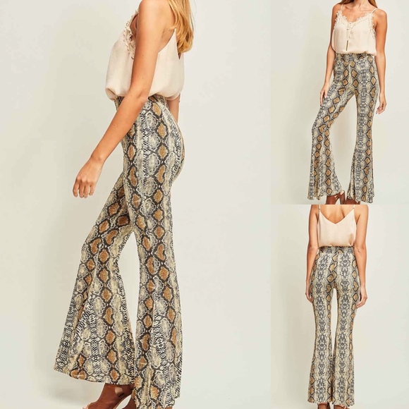 entro | Pants & Jumpsuits | New Arrivalreptile Print Flared Pants ...